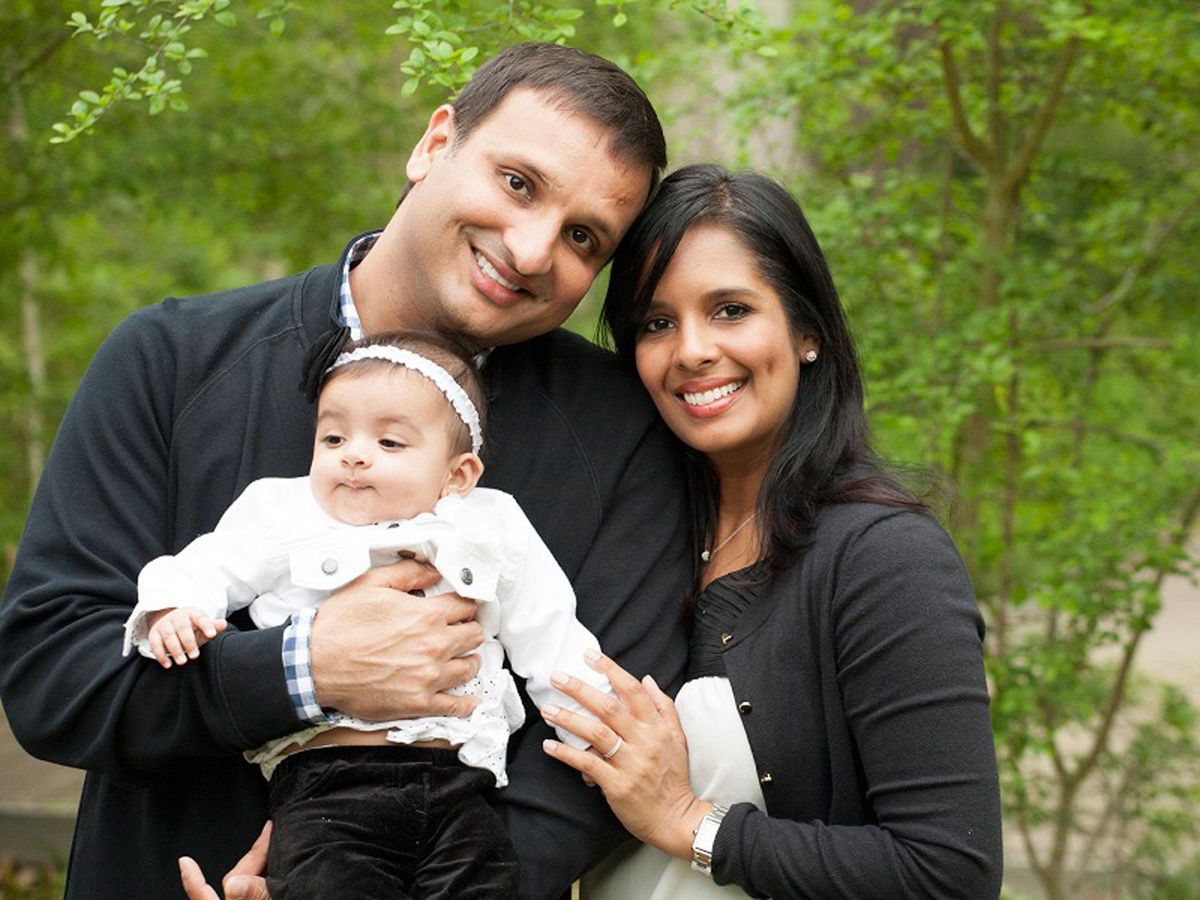 Cody and Kusum Patel with their baby Krishan. - CultureMap Houston