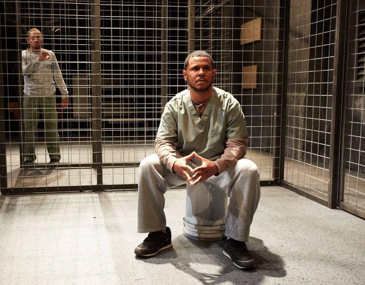 Mateo Mpinduzi-Mott (back) and Joe Palmore play prisoners wrestling ...