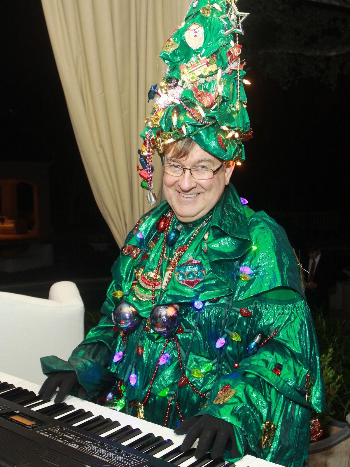 Marshall Maxwell dressed as "Mr. Christmas" performing at the M.D ...