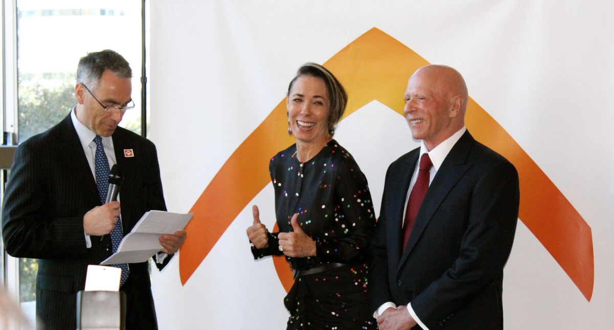 Bob Flexon, left, introduces Heart of Gold honorees Sue and Lester ...