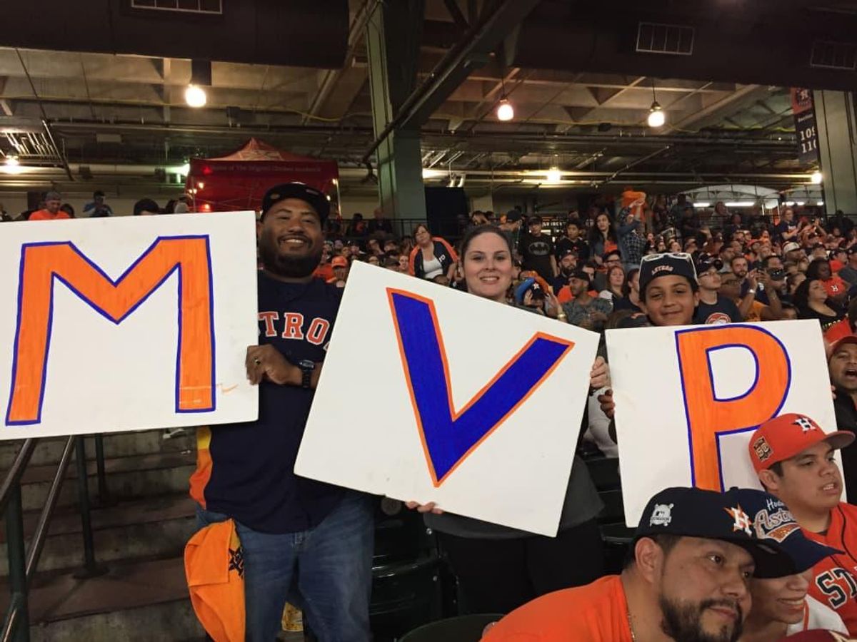 Fans Andrew Callis, Wendy Callis, and Collin Callas tout Jose Altuve ...