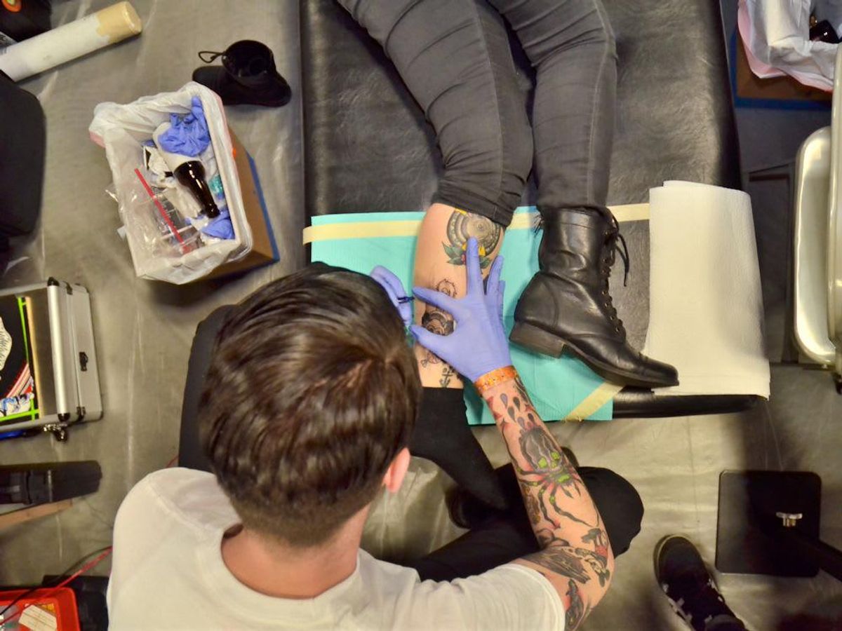 Erin Shadwick gets tattooed by Zack Shereck. - CultureMap Houston