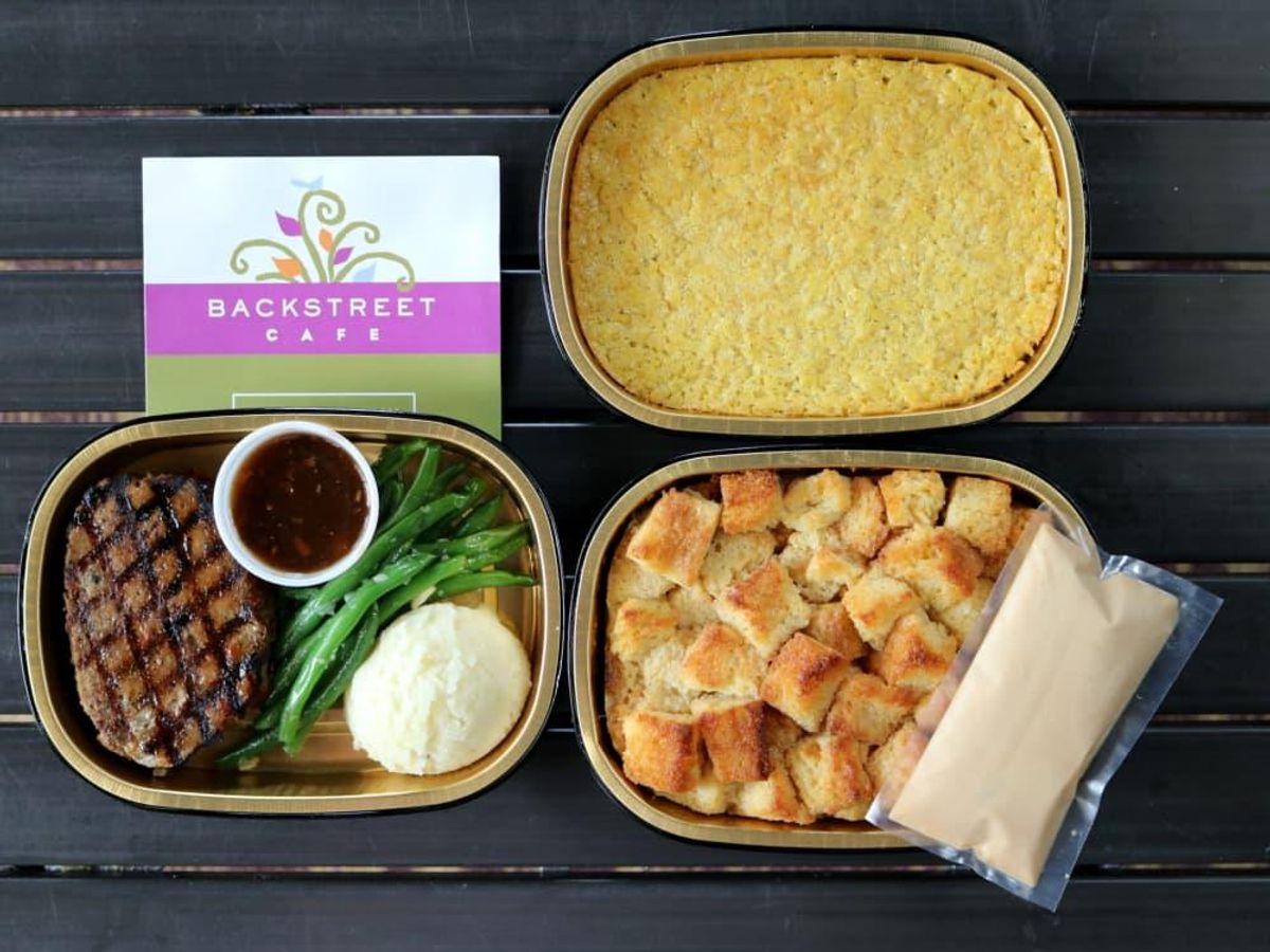 Get meatloaf and corn pudding from Backstreet Cafe. - CultureMap Houston