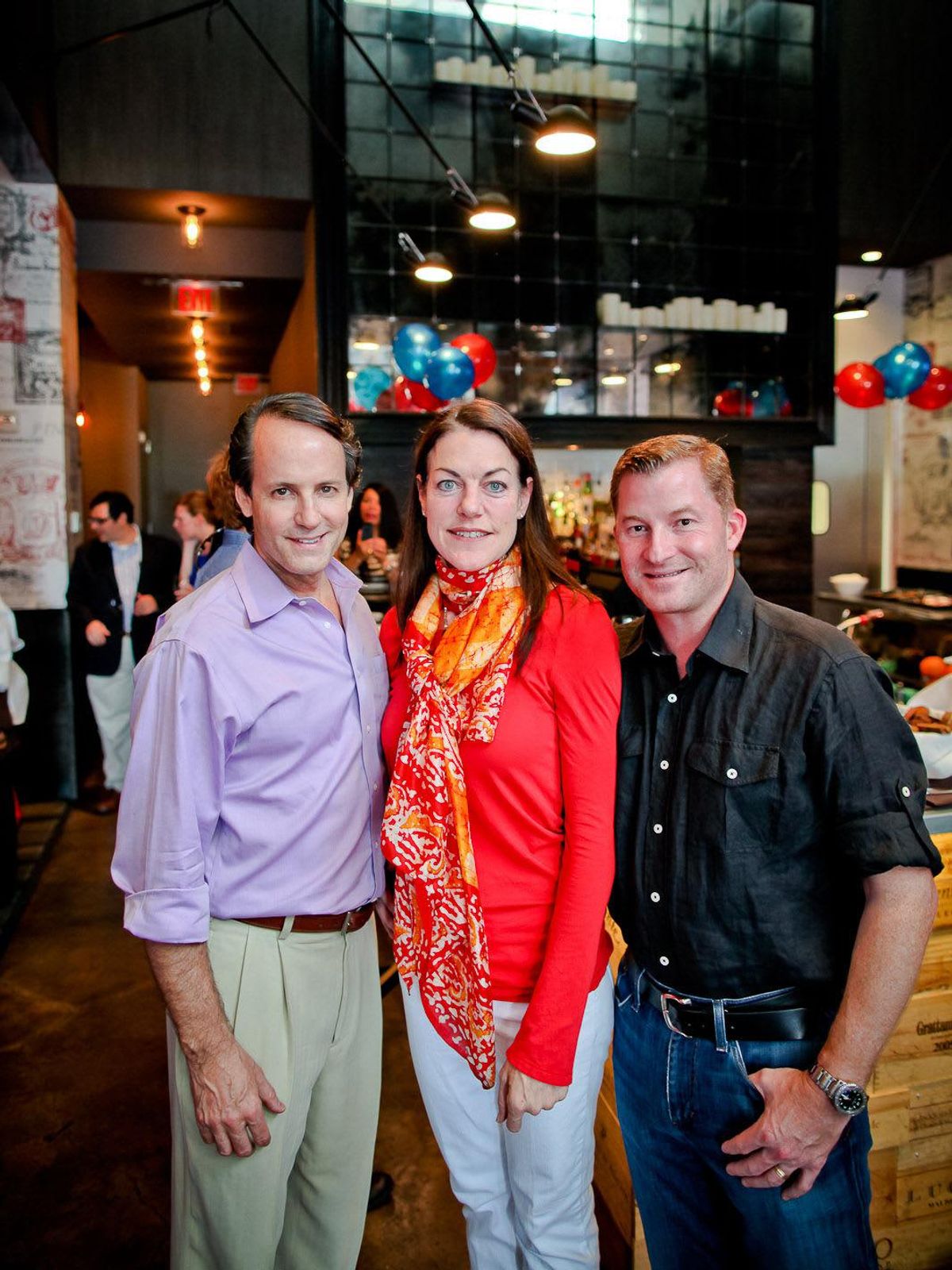 Kevin Stolle, left, with Kimberly and Palmer Giddings at the Bastille ...