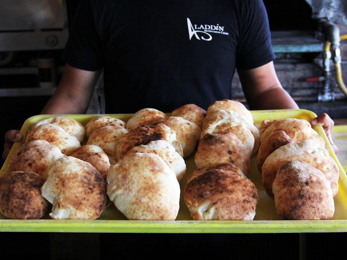 Freshly baked pita at Aladdin. - CultureMap Houston