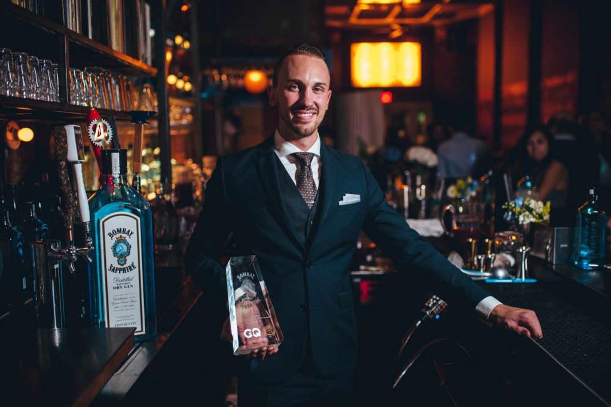 Austin bartender Justin Lavenue poses with his trophy. - CultureMap Houston