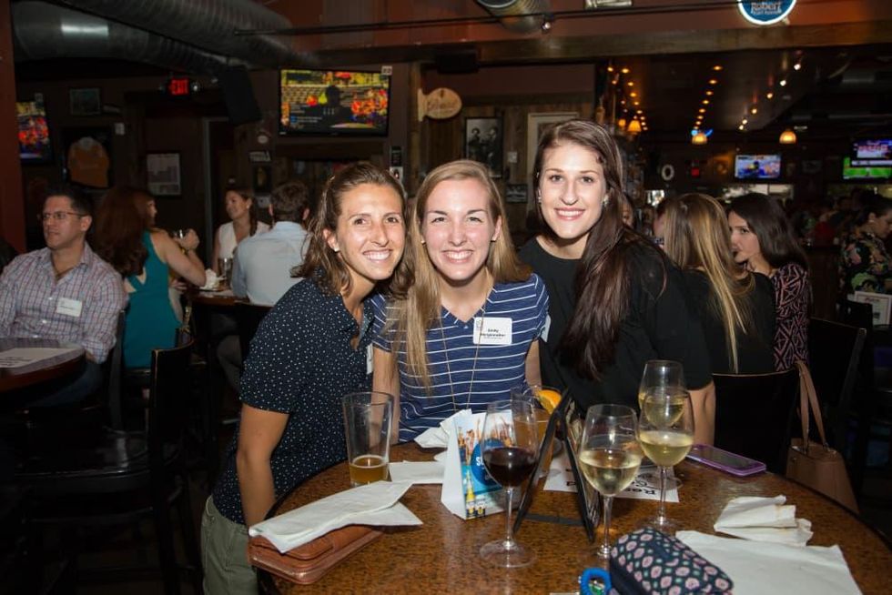 Young professionals take over Little Woodrow's for an early summer ...