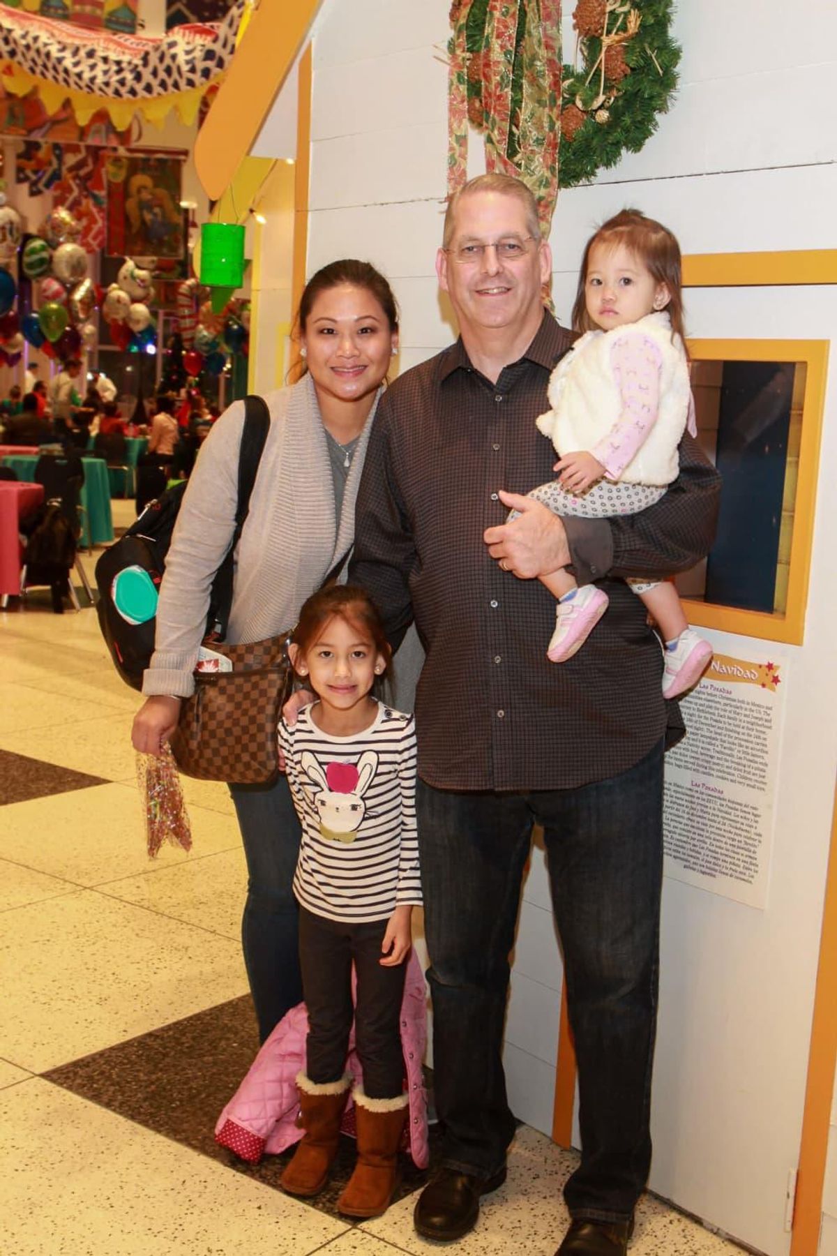 Linda Dang, Tom Debesse, and daughters. - CultureMap Houston