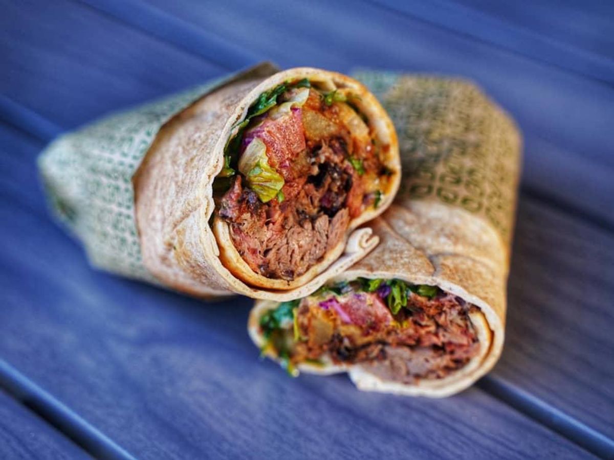 Get a smoked lamb shawarma at Craft Pita. - CultureMap Houston