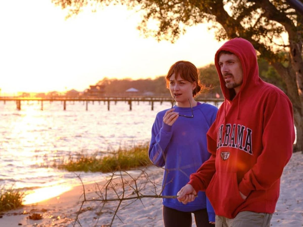 Dakota Johnson and Casey Affleck in Our Friend. - CultureMap Houston