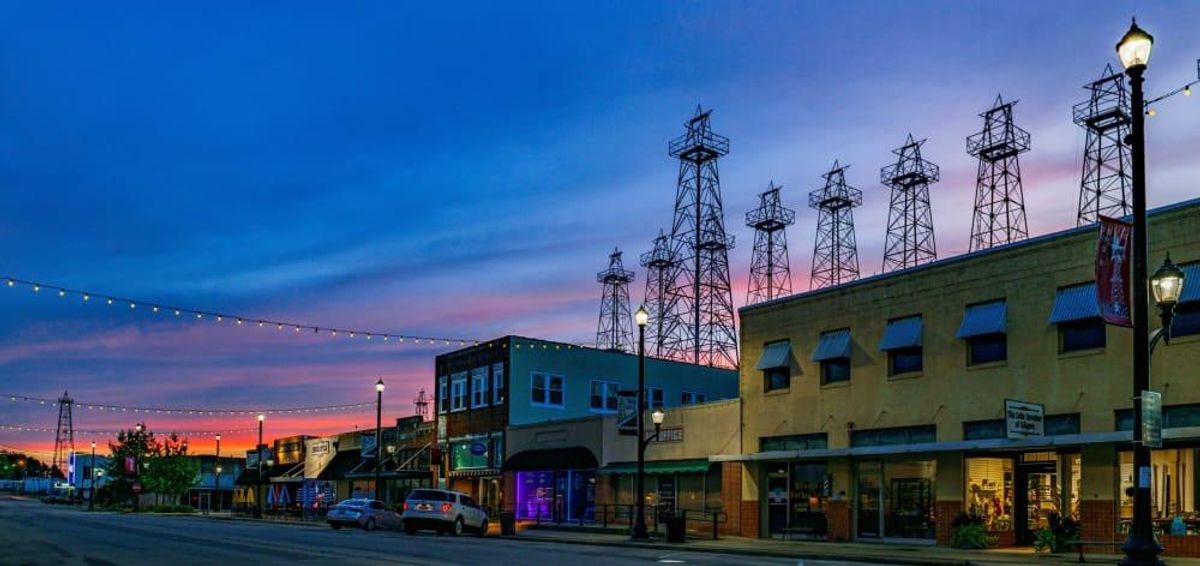 Oil derricks dot the skyline of historic downtown Kilgore. - CultureMap ...
