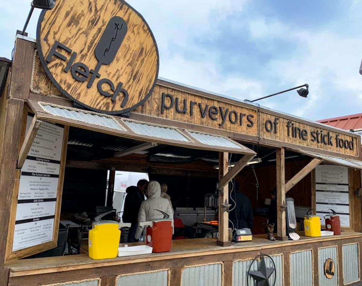 Find the Fletch corn dog stand at the rodeo carnival. - CultureMap Houston