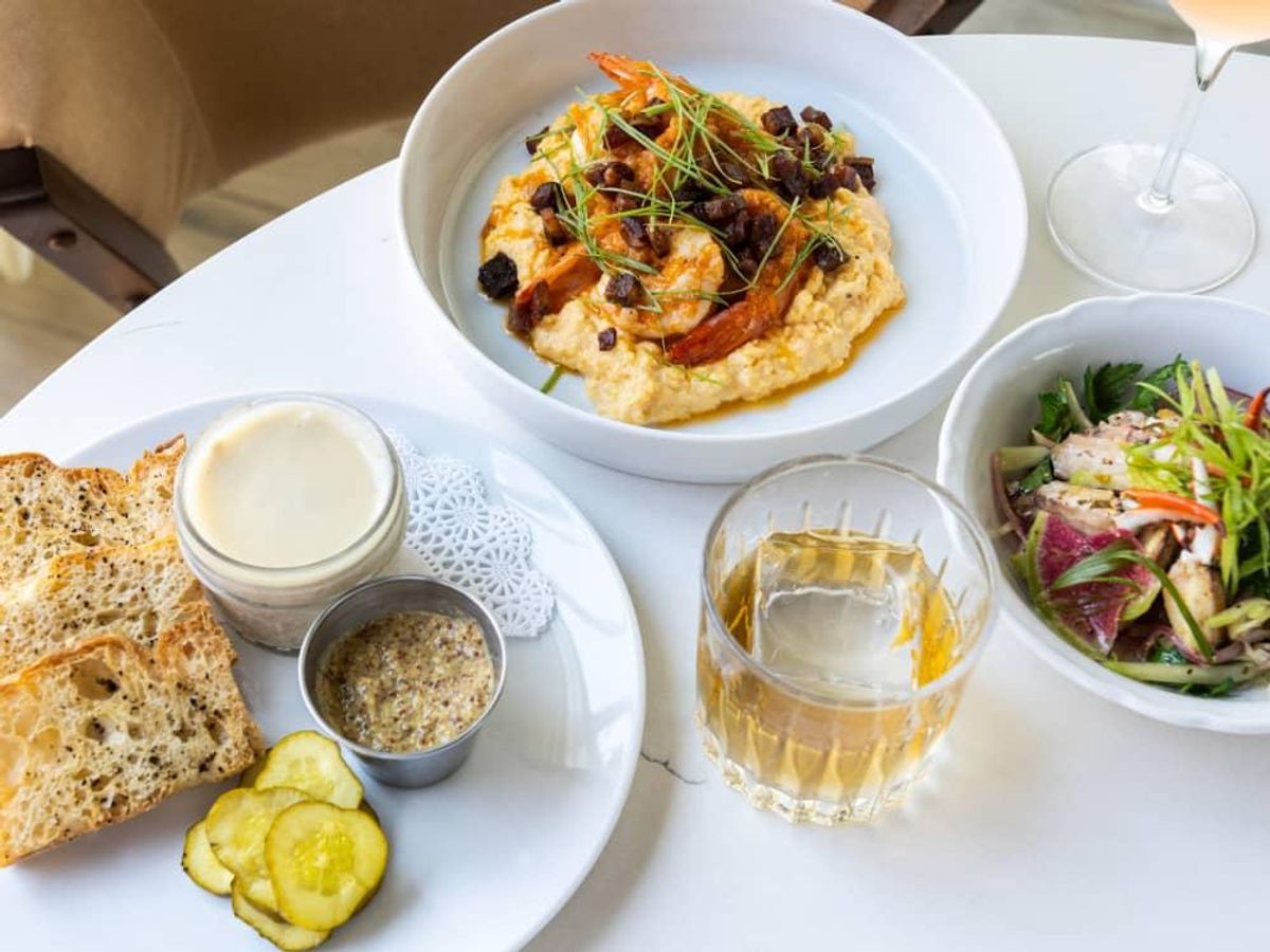 Pork rillette, shrimp and grits, and marinated crab fingers ...