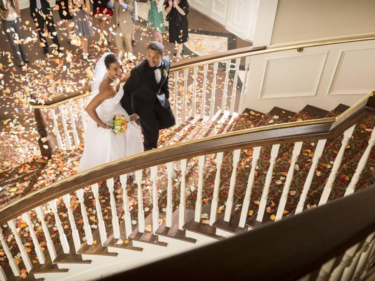 The Grand Staircase of The Tremont Ballroom offers a grand entrance for ...