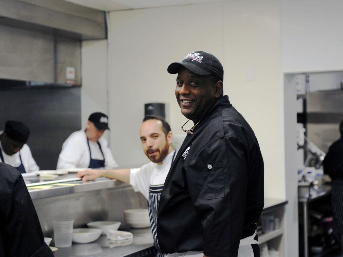 Chef Mark Holley, front, with sous chef Brandon Silva, left ...