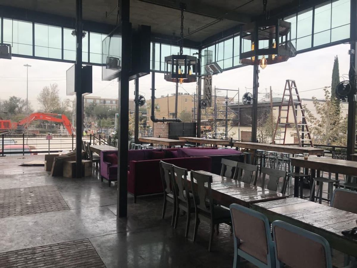 A covered patio provides most of the seating. - CultureMap Houston