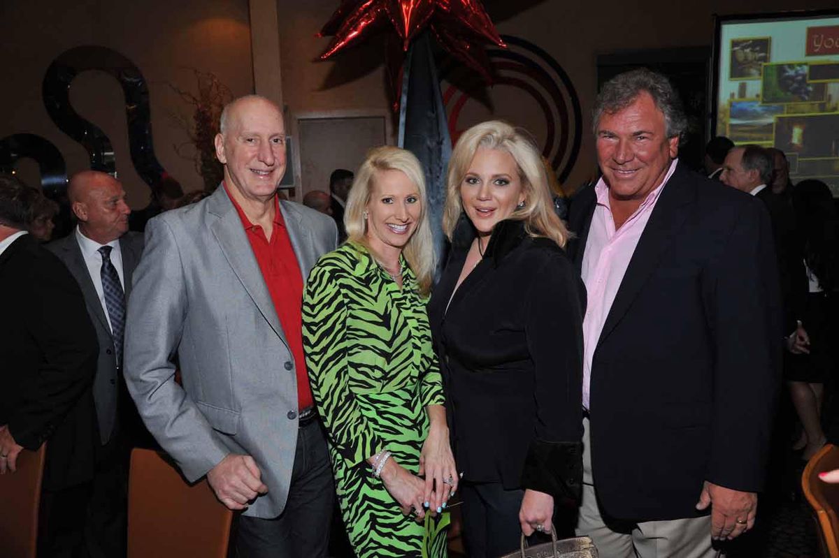 Tracy and Laurie Krohn, left, with Kristi and John Schiller ...