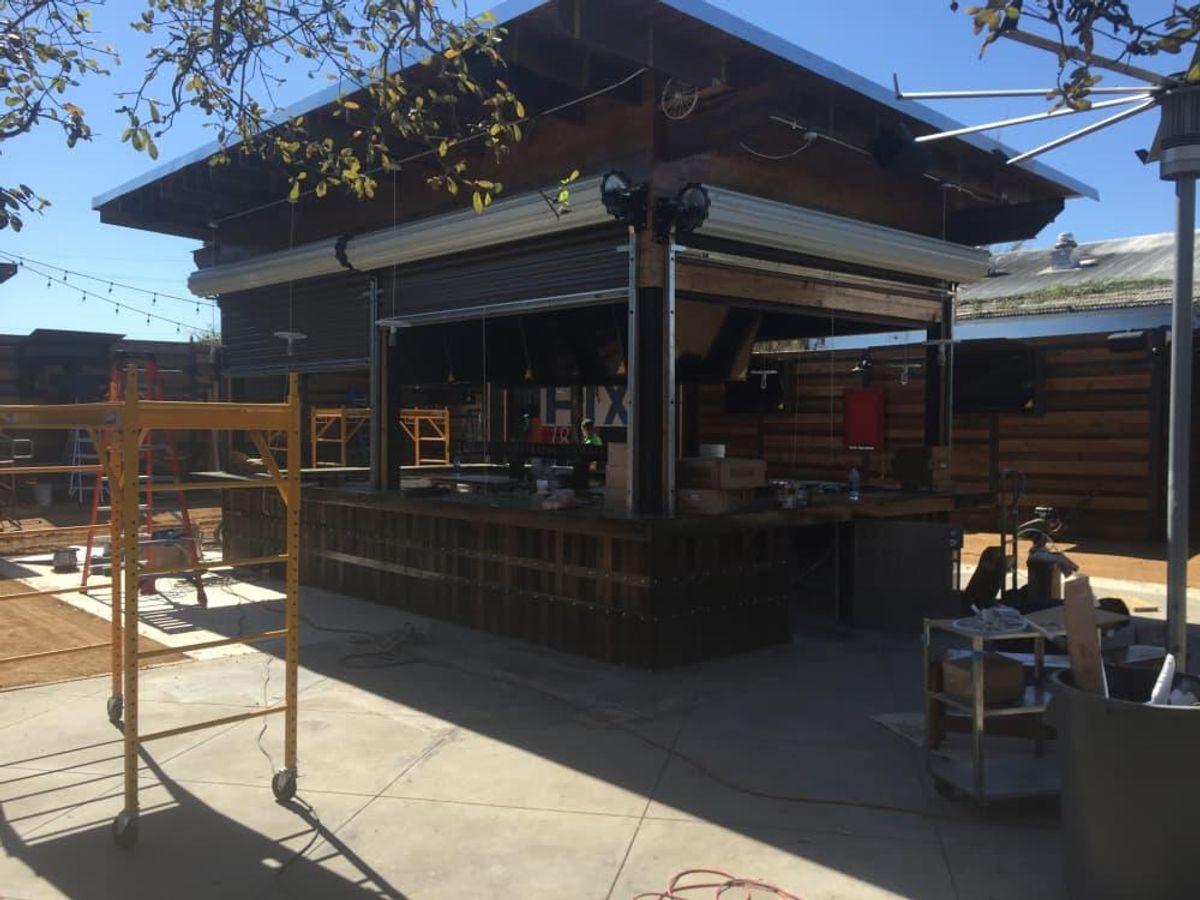 A large outdoor bar is one of the new features. - CultureMap Houston