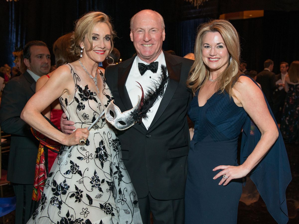 Jana and Scotty Arnoldy, left, with Millette Sherman. - CultureMap Houston