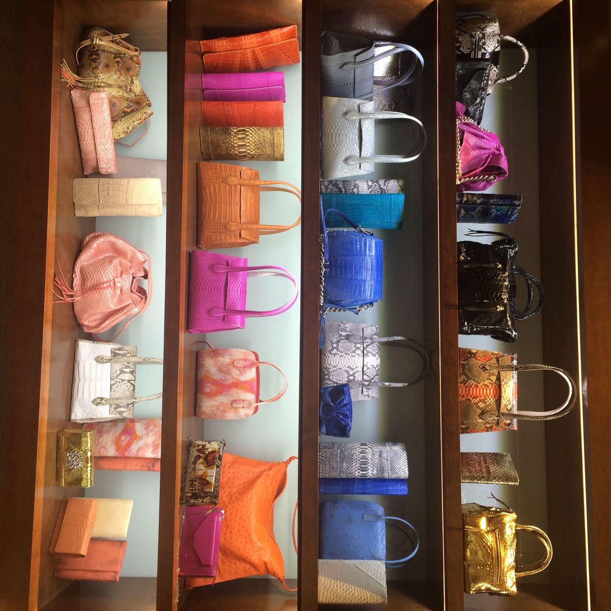 Bright colors are a Carlos Falchi handbag trademark. - CultureMap Houston