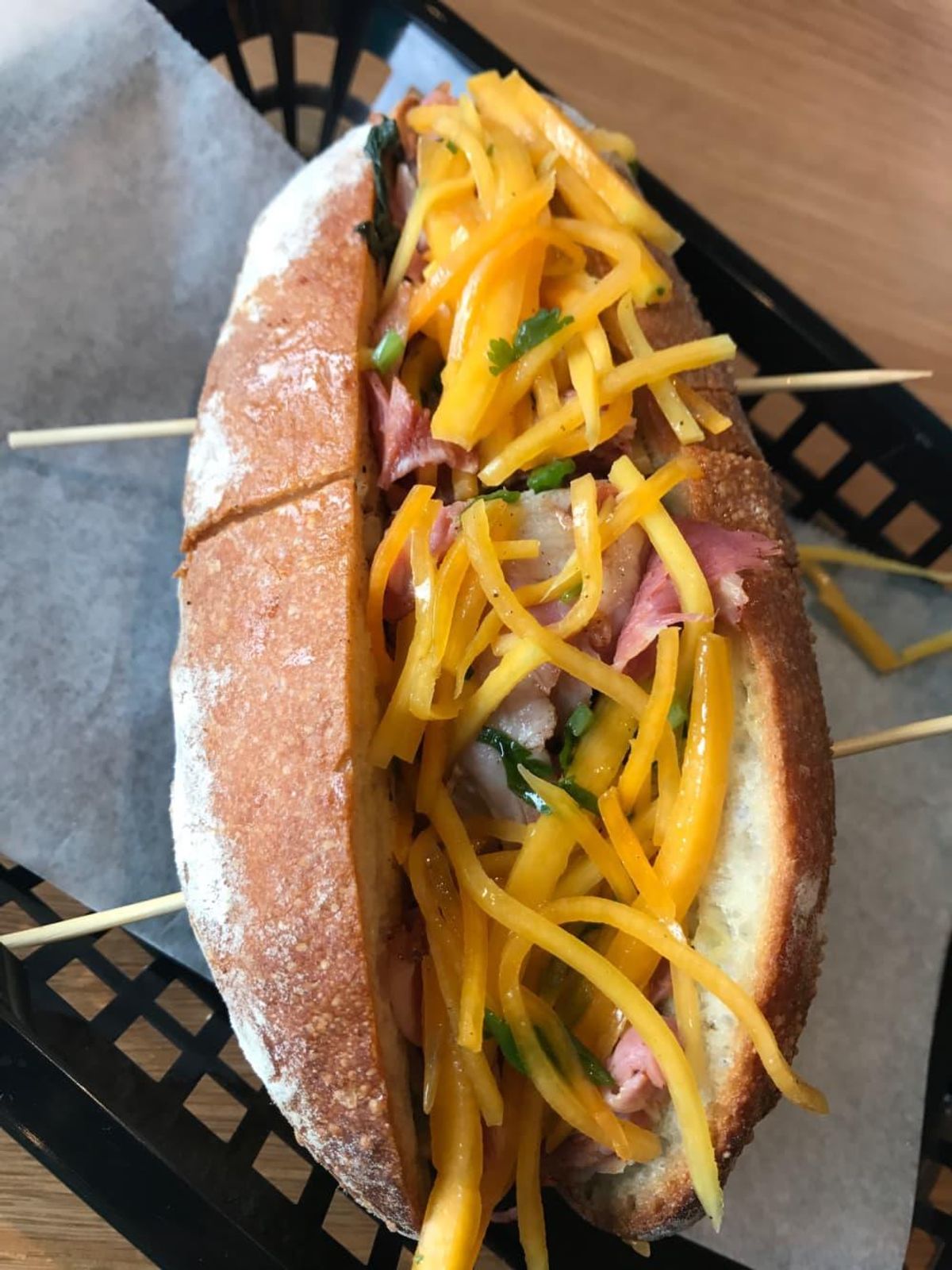 Black Hill Ranch ham with butternut slaw on baguette. - CultureMap Houston