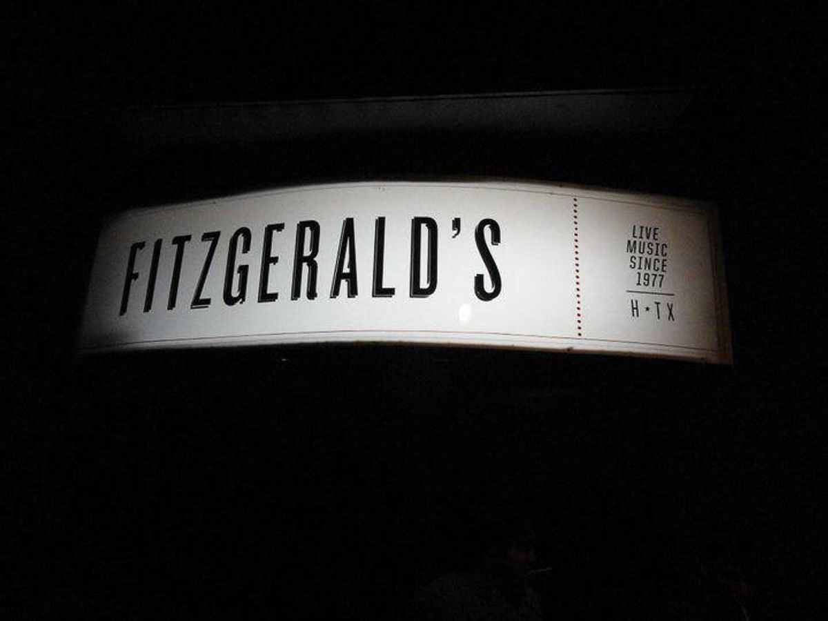 The Fitzgerald's signs brags that it has been featuring live music ...