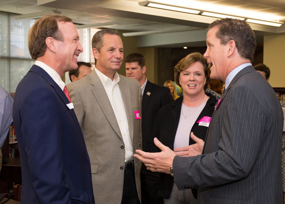Sports biggies return to the classroom with Neil Bush and hit the books ...