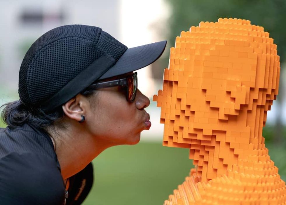 Colorful LEGO people sculptures stack up in downtown Houston parks for ...