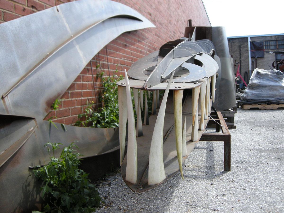 Primordial Fish in the service yard at Tatu Metal Art and Capitol ...