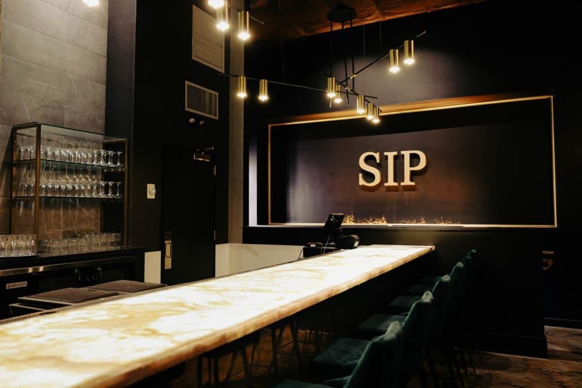 Grab a drink upstairs at Sip. - CultureMap Houston