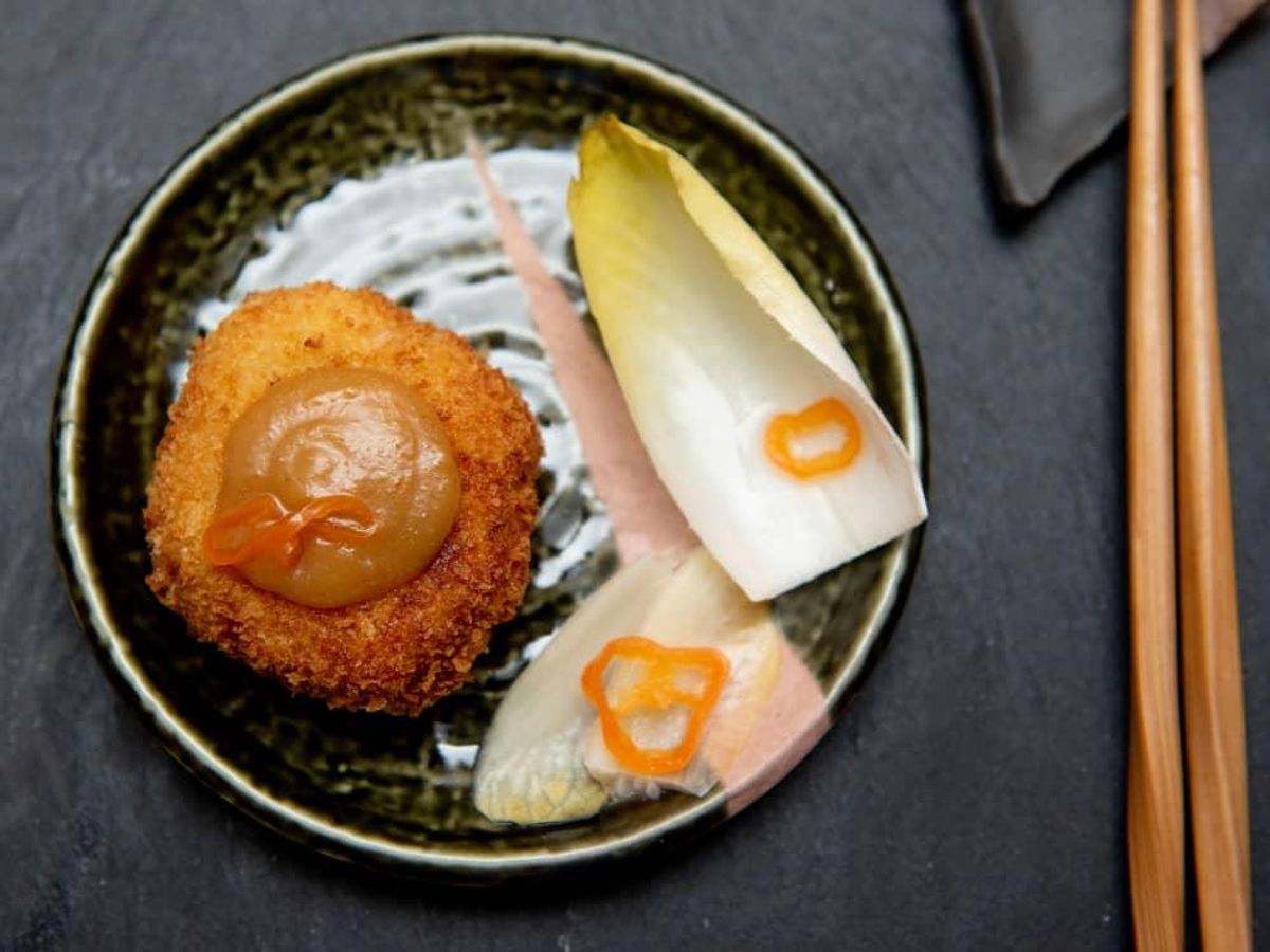 Crab Agemono with orange-miso brown butter emulsion. - CultureMap Houston