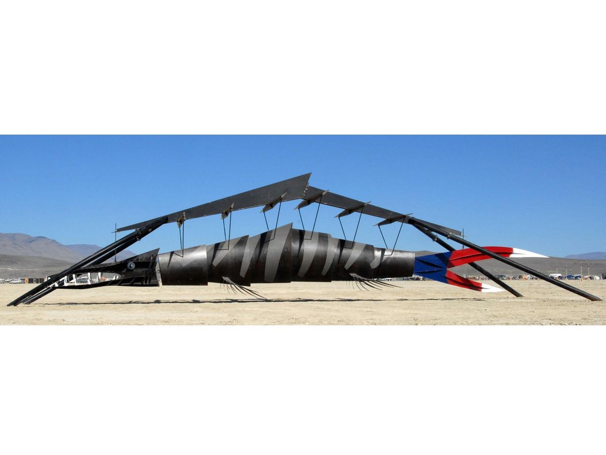 Primordial Fish gently swings in the wind with its articulated body ...