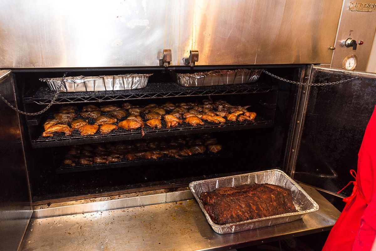 A look inside the Throw Down Cookers rotisserie smoker. - CultureMap ...