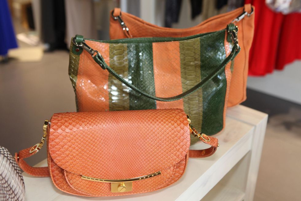 Celebrity designer's new high-end handbags showcased in Houston ...