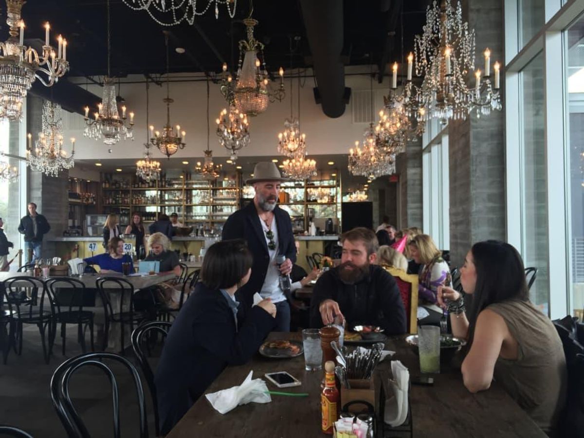 Grant Cooper greets diners at The Dunlavy. - CultureMap Houston