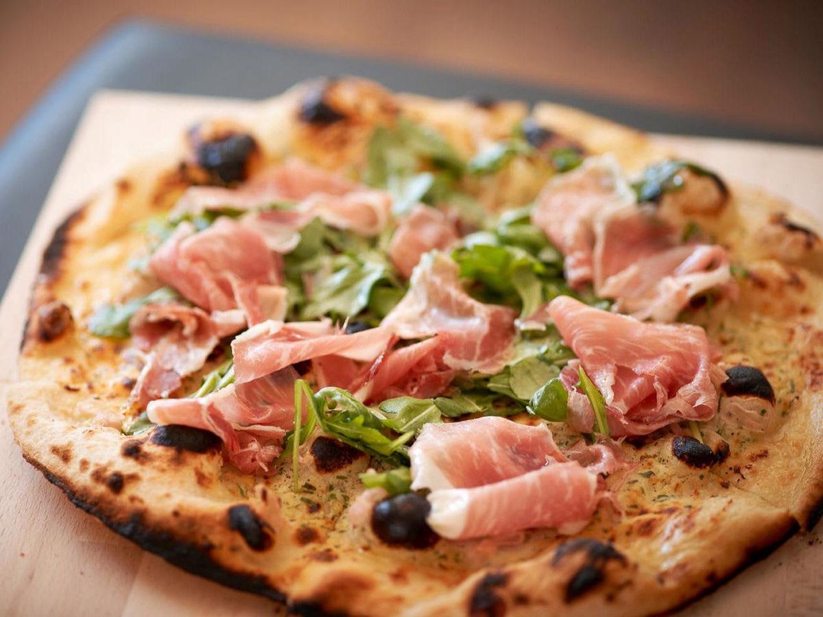 At Provisions, the pizza may arrive topped with the ham of the day ...