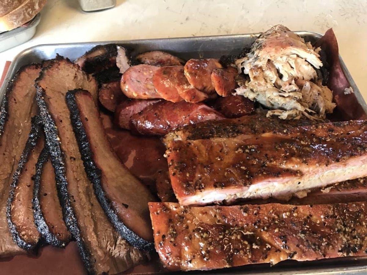 A barbecue platter from Truth BBQ in Brenham. - CultureMap Houston