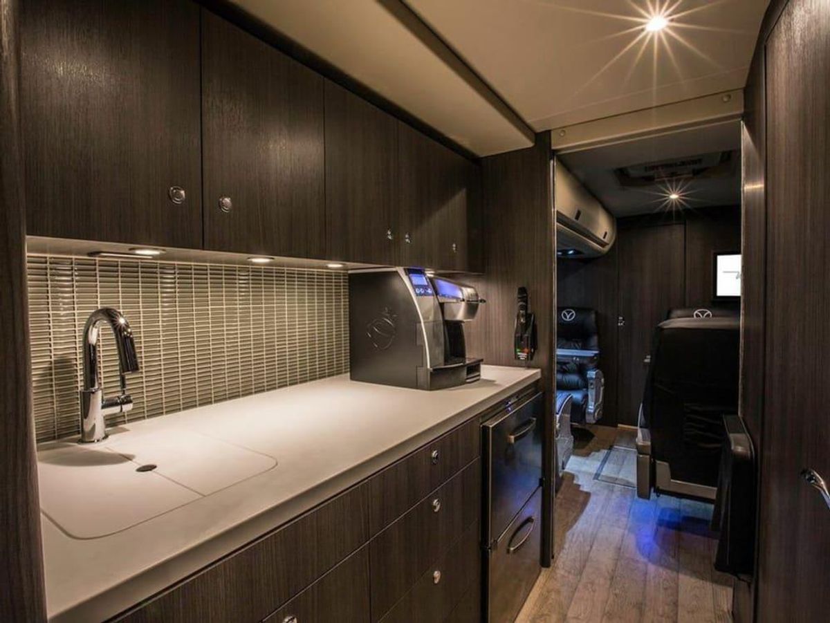 View of the kitchen space in the luxury motor coach service Vonlane ...